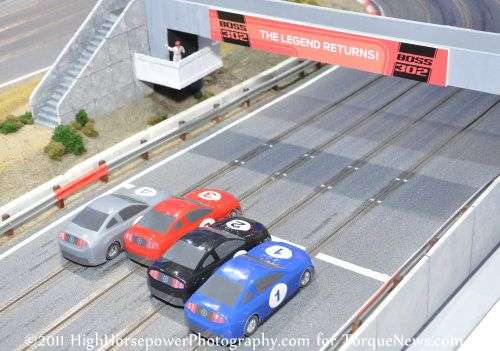 The small scale Boss Mustangs of the Ford display slot car race ...